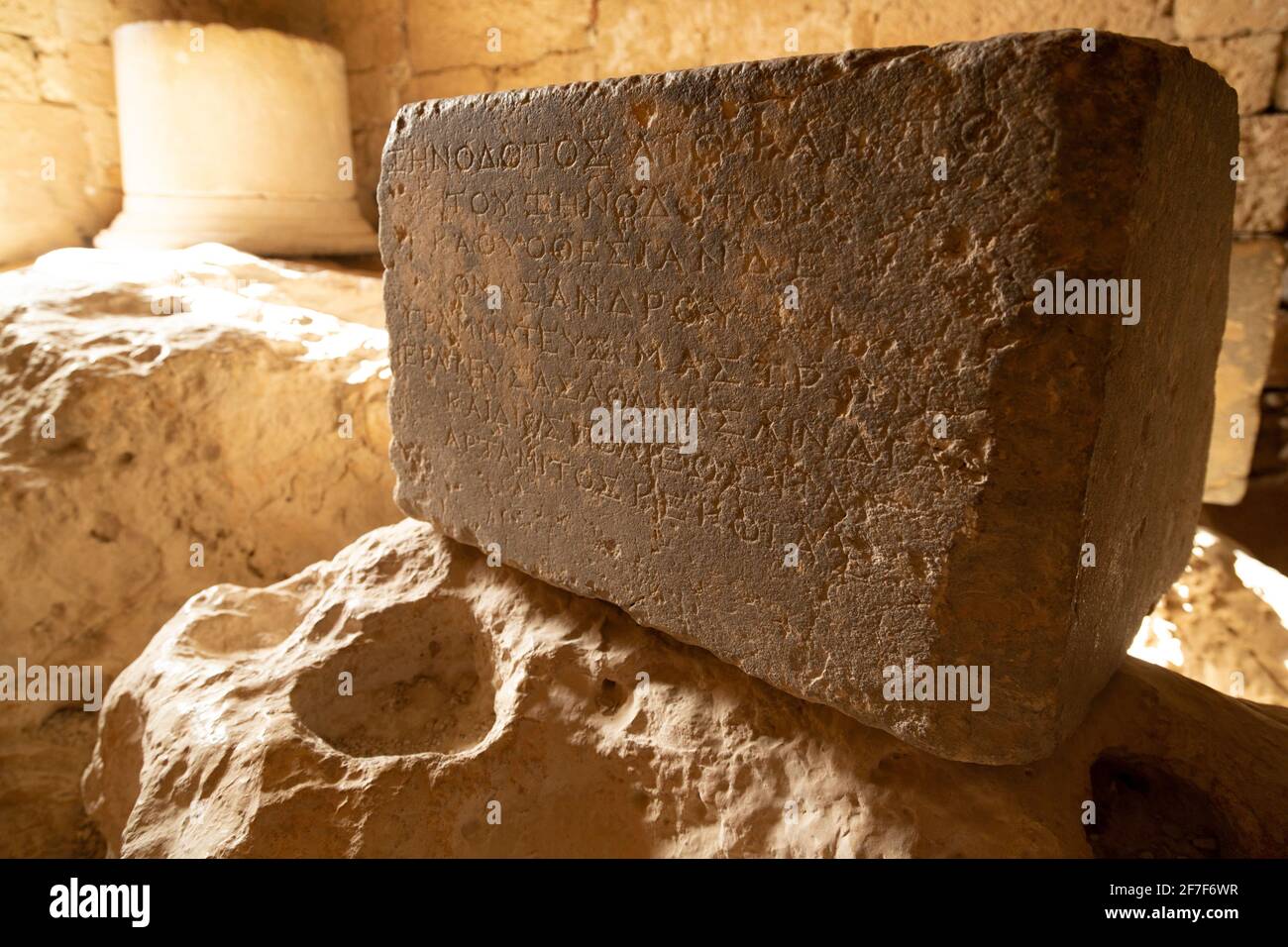 Stone block inscribed with Greek writing at the Lindian Acropolis in on ...