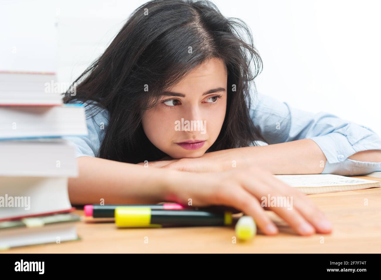Bored teen girl table hi-res stock photography and images - Alamy