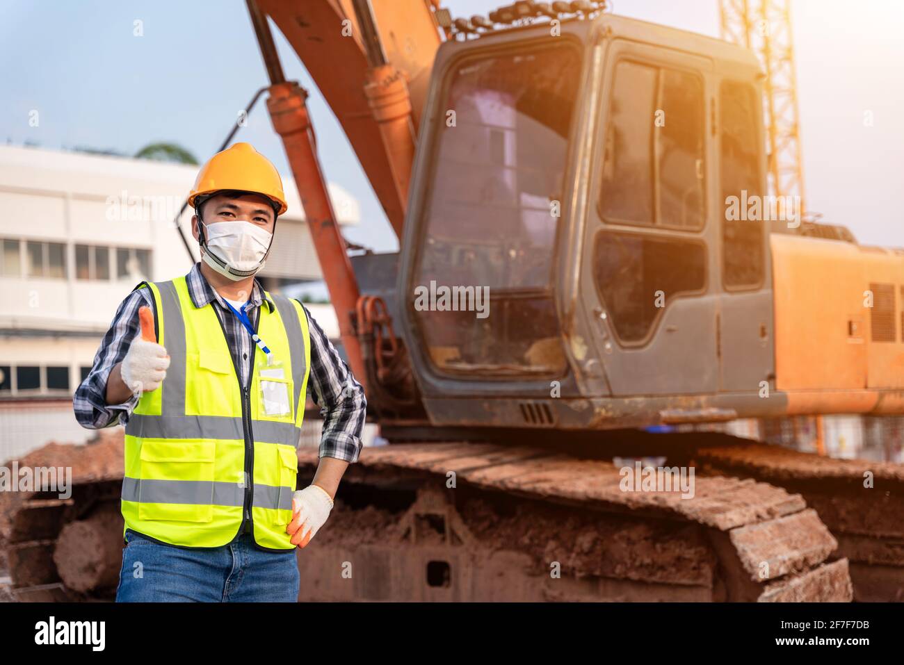 Portrait of Foreman Construction excavator, engineer or worker backhoe ...