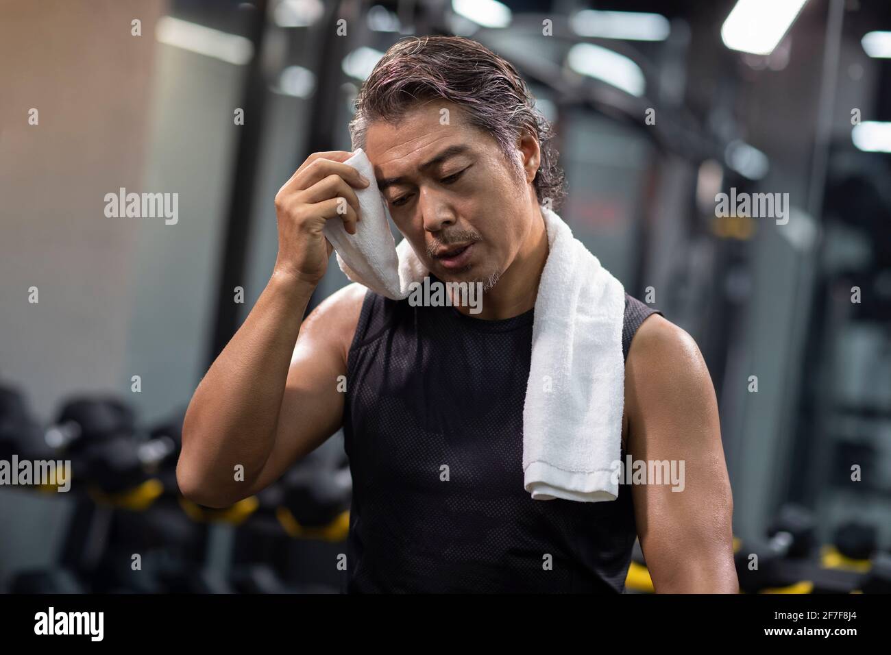 Man wiping sweat hi-res stock photography and images - Alamy
