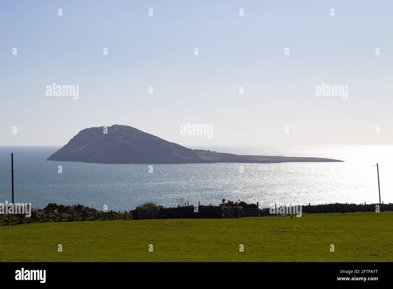 Aberdaron, Wales. Bardsey island seen from cliffs over the sea ...