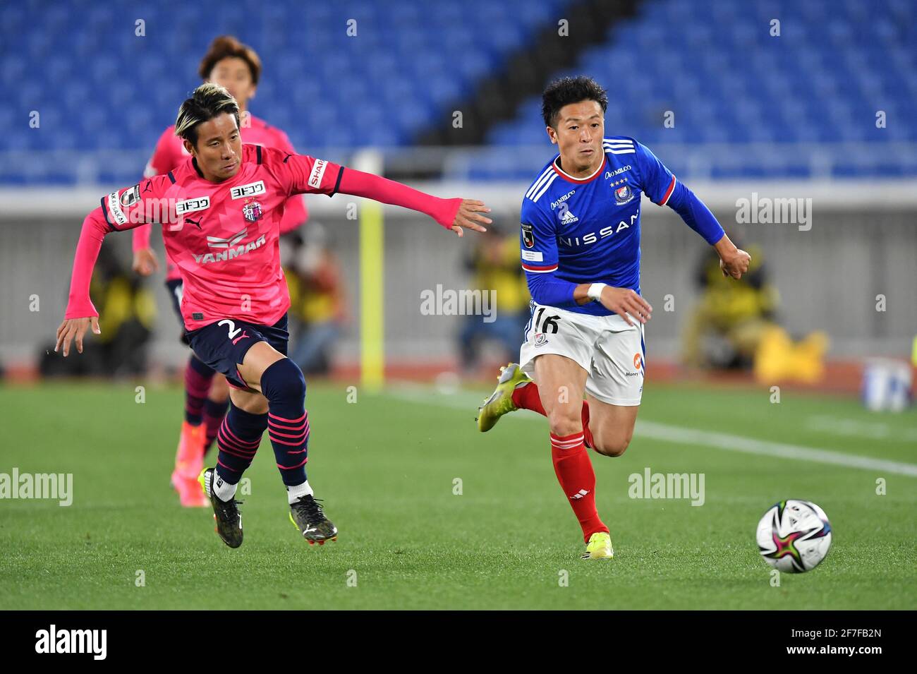 Riku Matsuda (2) of Cerezo Osaka and Ryo Takano (16) of Yokohama F.Marinos during the 2021 J1 ...