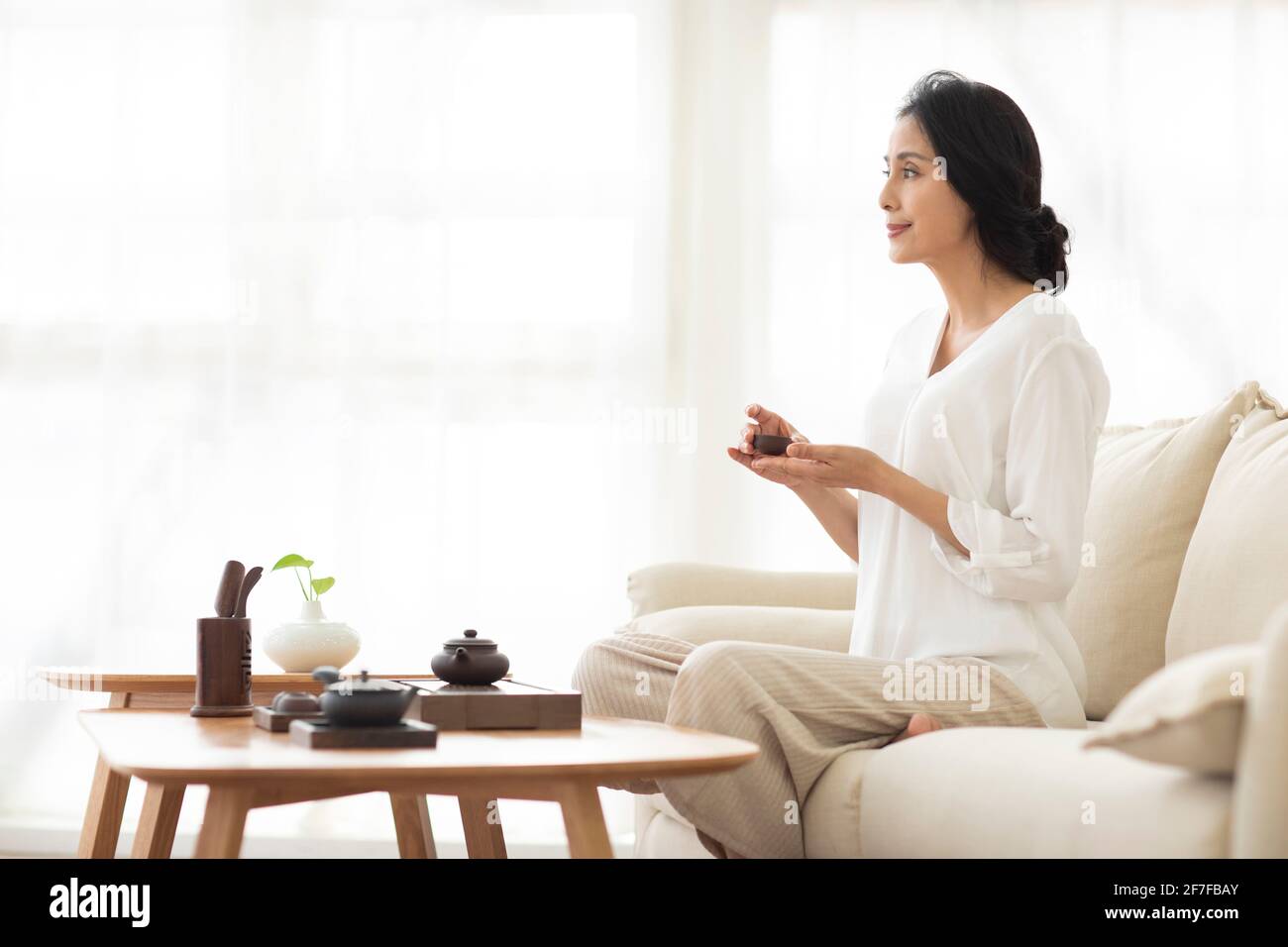 Mature woman tea tasting hi-res stock photography and images - Alamy