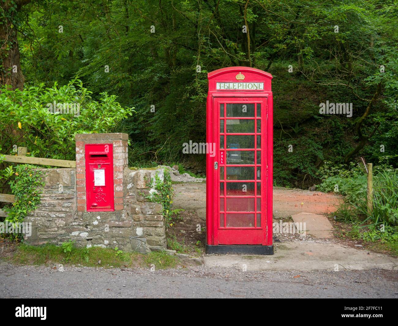 A traditional red telephone box and post box in the Heddon Valley near ...