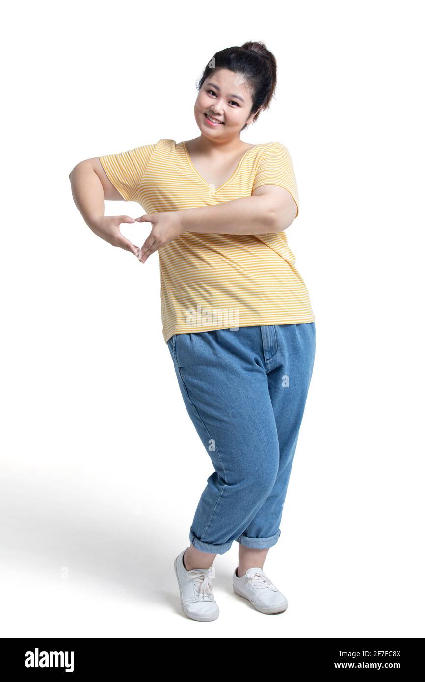 Young people making heart shape Cut Out Stock Images & Pictures - Alamy