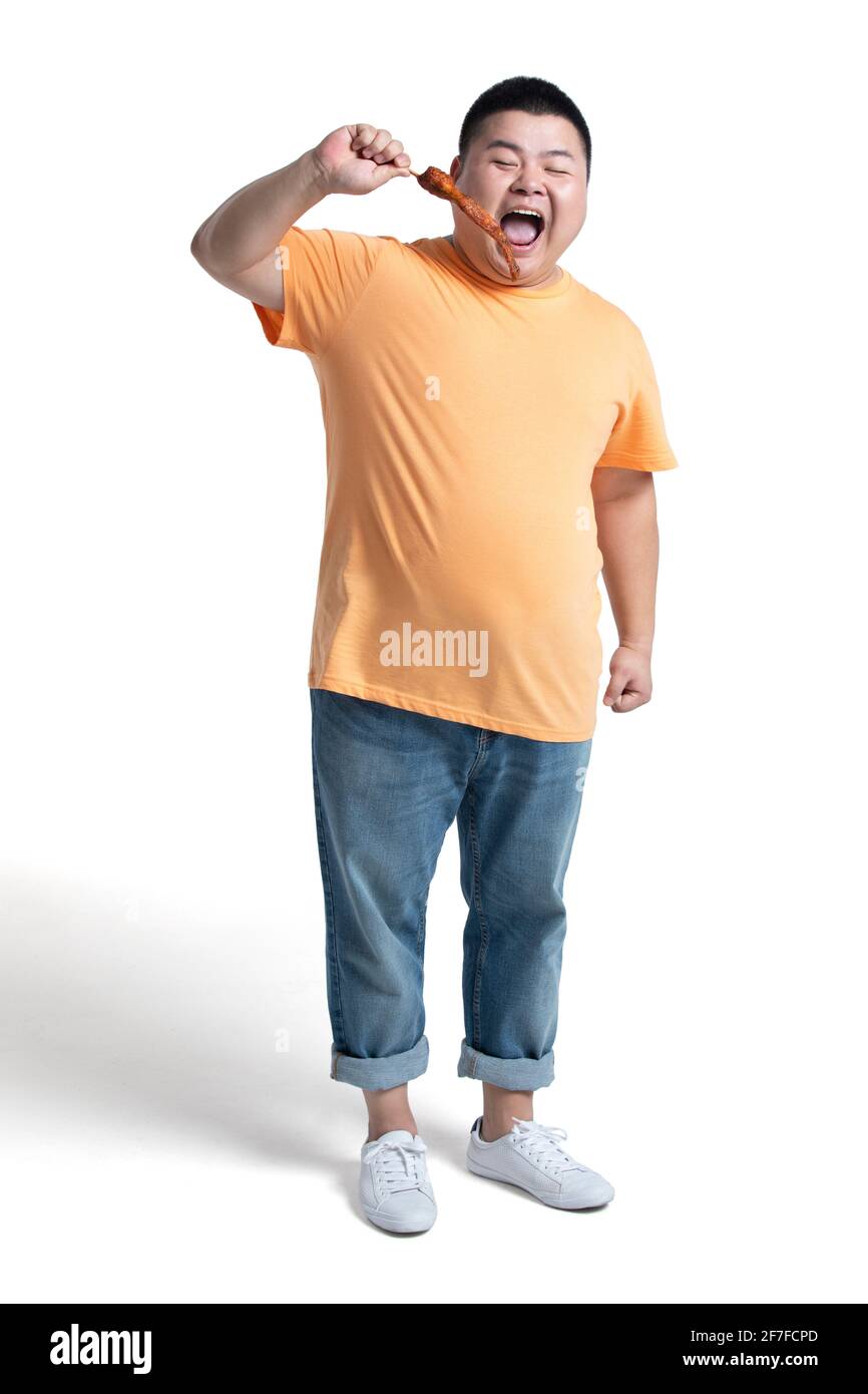 Eating fried food hi-res stock photography and images - Alamy