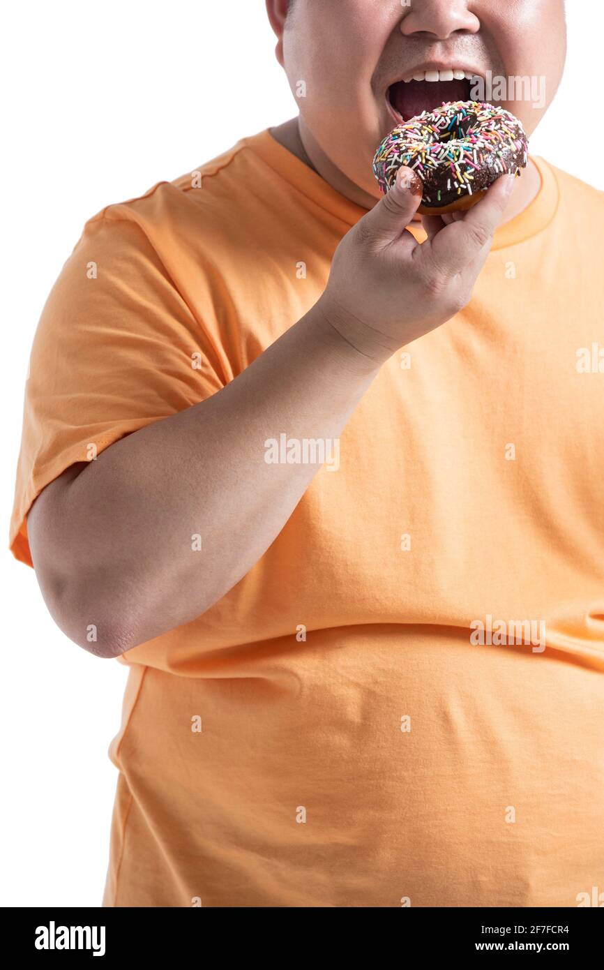 Young man eating donut hi-res stock photography and images - Alamy