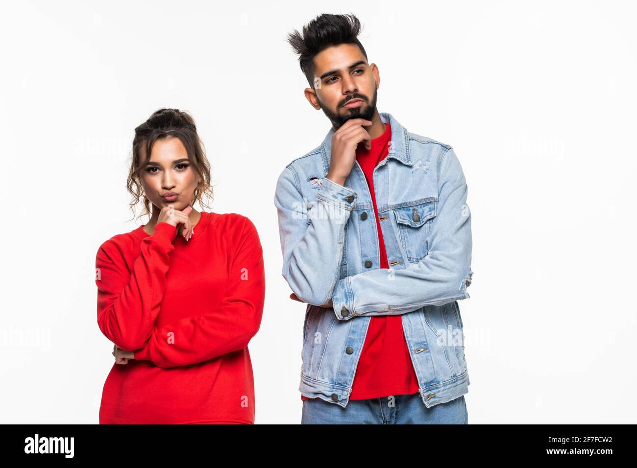 Thoughtful couple isolated over a white background Stock Photo - Alamy