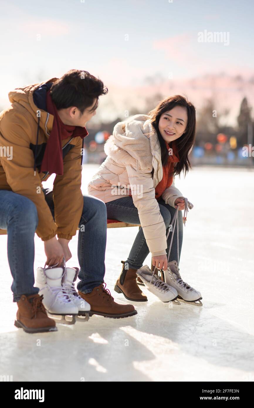 Husband and wife skating hi-res stock photography and images - Alamy