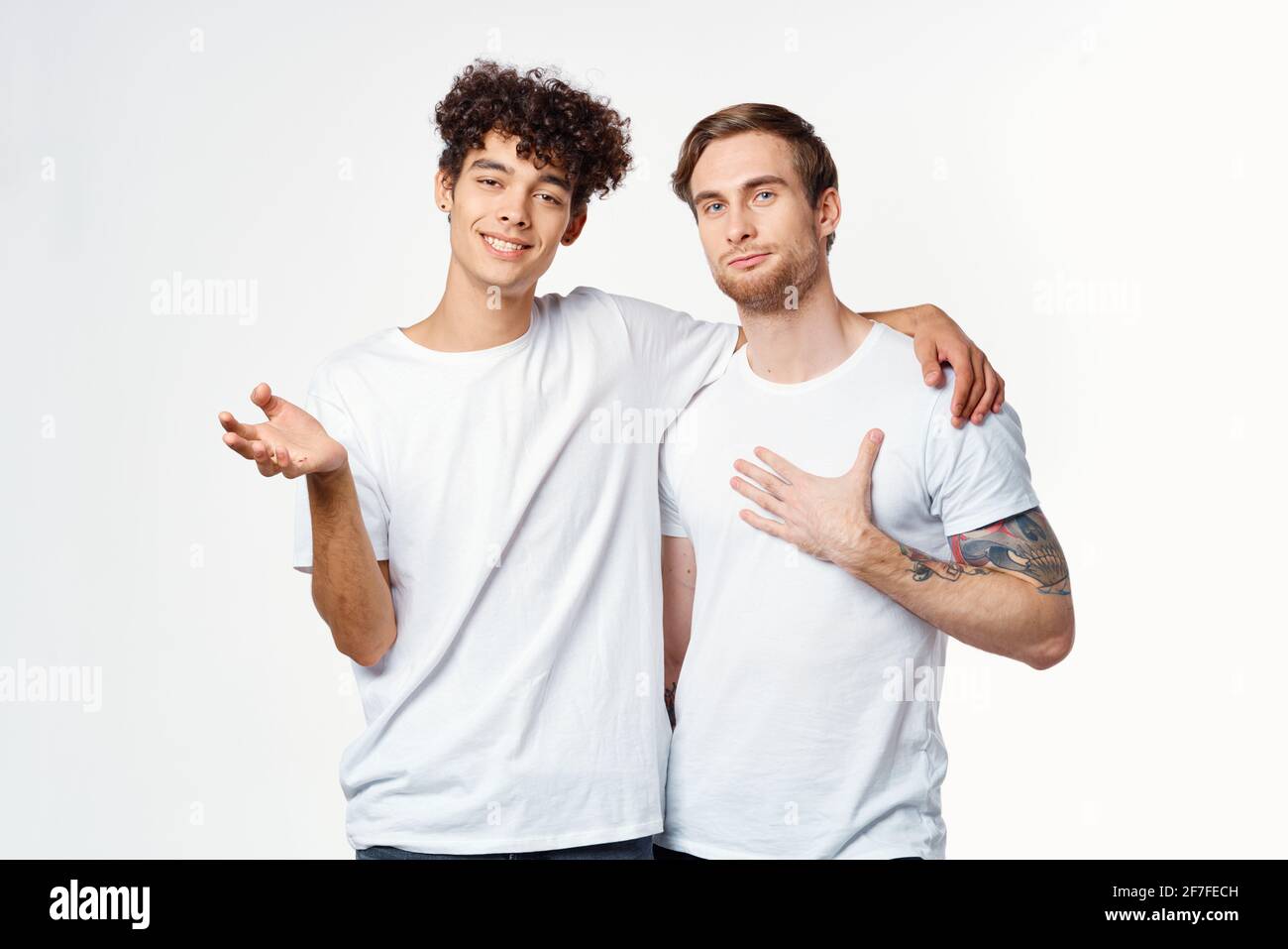 Portrait two brothers standing back hi-res stock photography and images ...