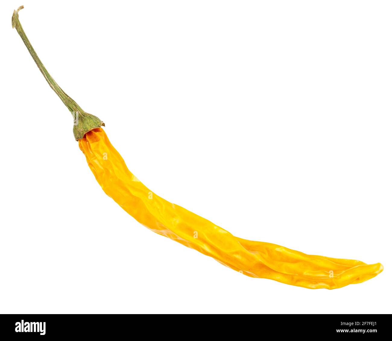 Yellow dried chili pepper isolated on white background Stock Photo - Alamy
