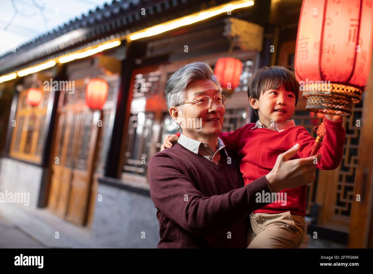 Happy family and Chinese lantern Stock Photo - Alamy