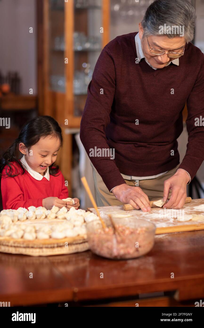 Happy family making dumplings Stock Photo - Alamy Happy family making dumplings Stock Photo - Alamy