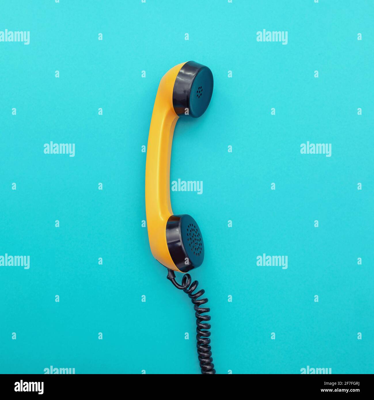 Plastic yellow retro vintage tephone handset Stock Photo - Alamy
