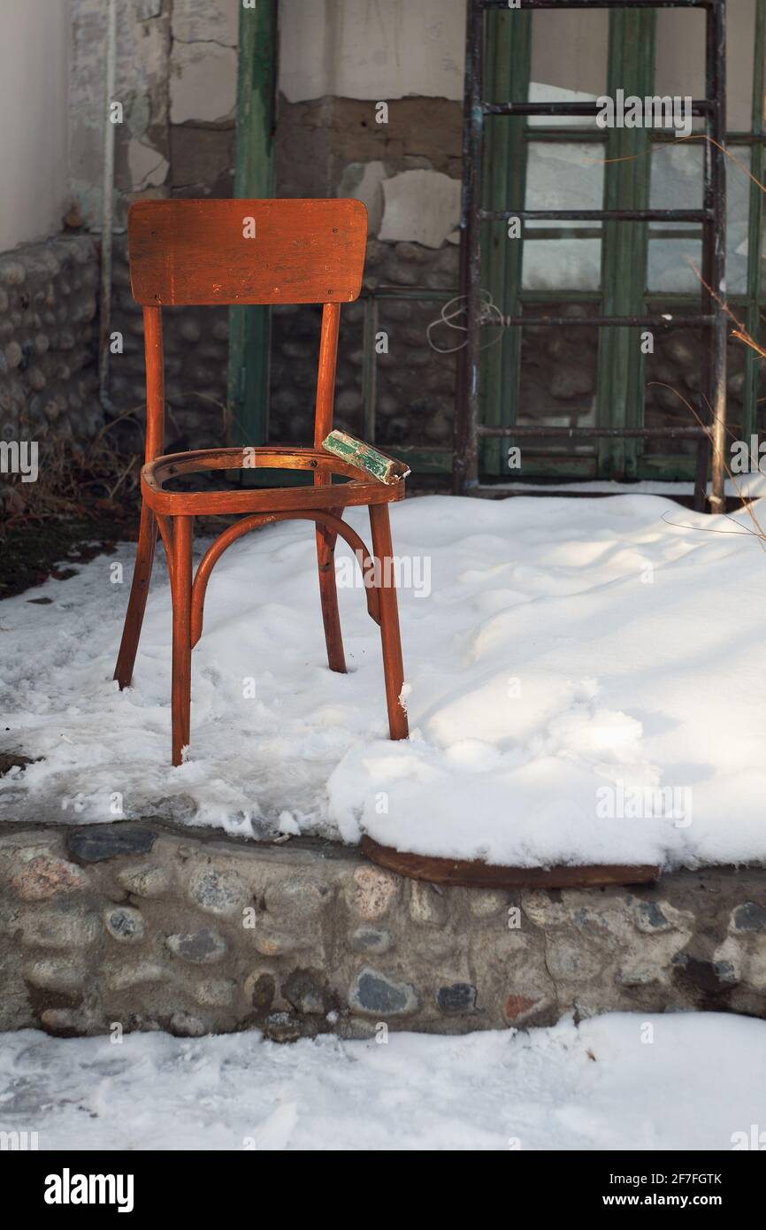 the old damaged chair on a backyard Stock Photo - Alamy
