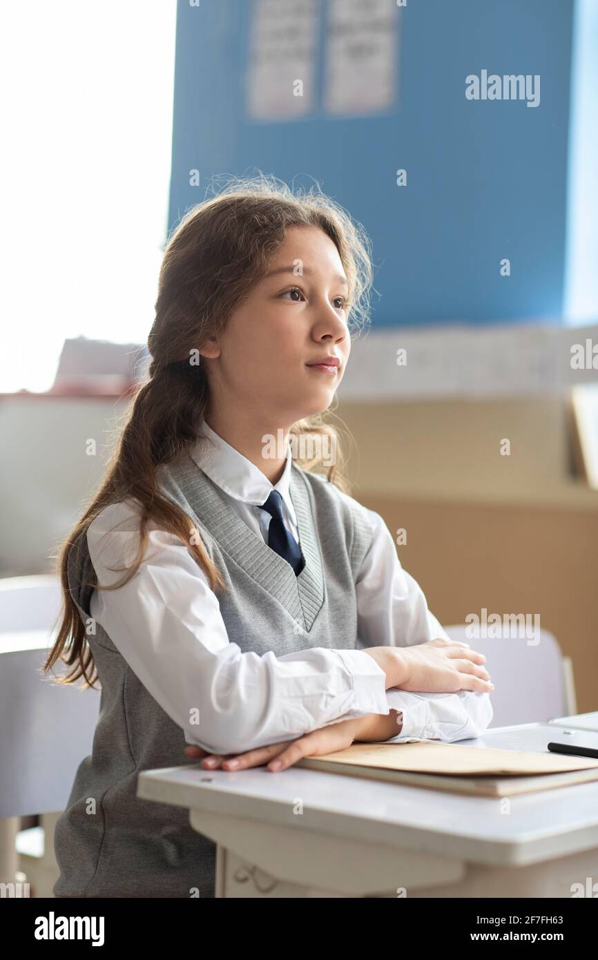 Little girl learning in classroom Stock Photo - Alamy