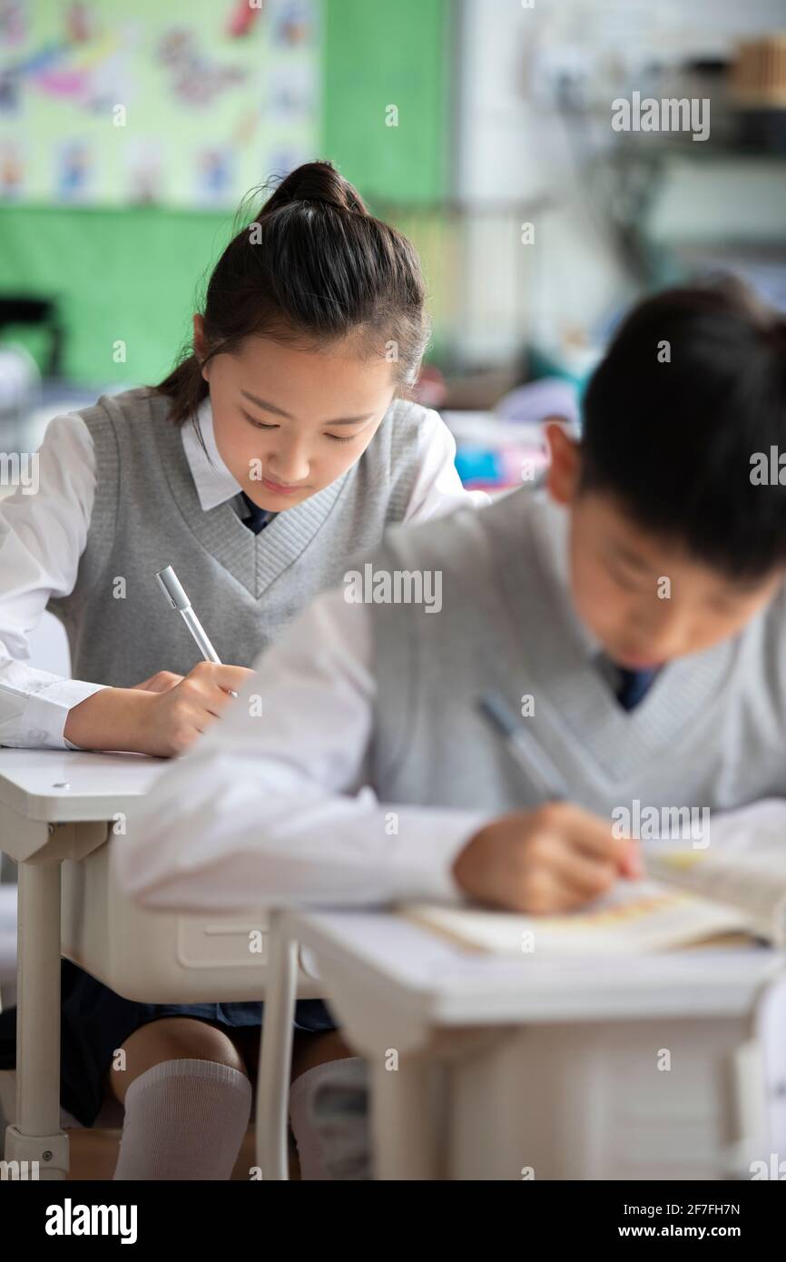 Asian book boys chinese classroom hi-res stock photography and images ...