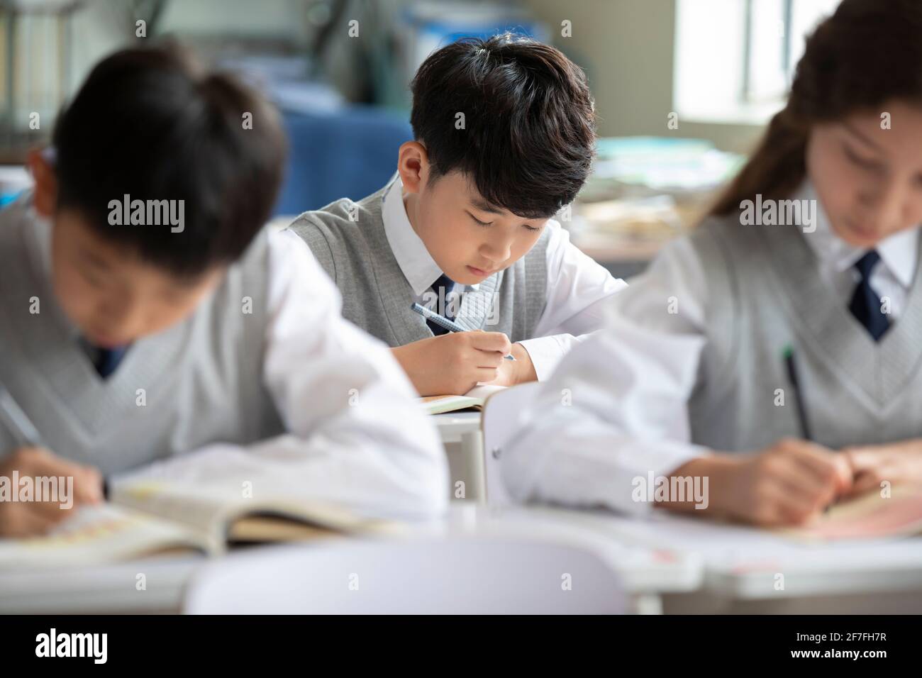 Students learning in classroom Stock Photo - Alamy