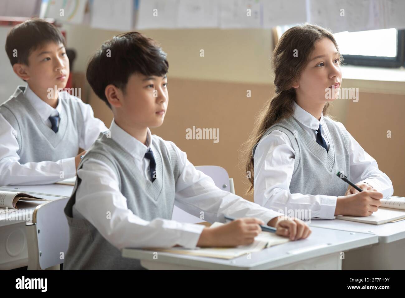 Students learning in classroom Stock Photo - Alamy