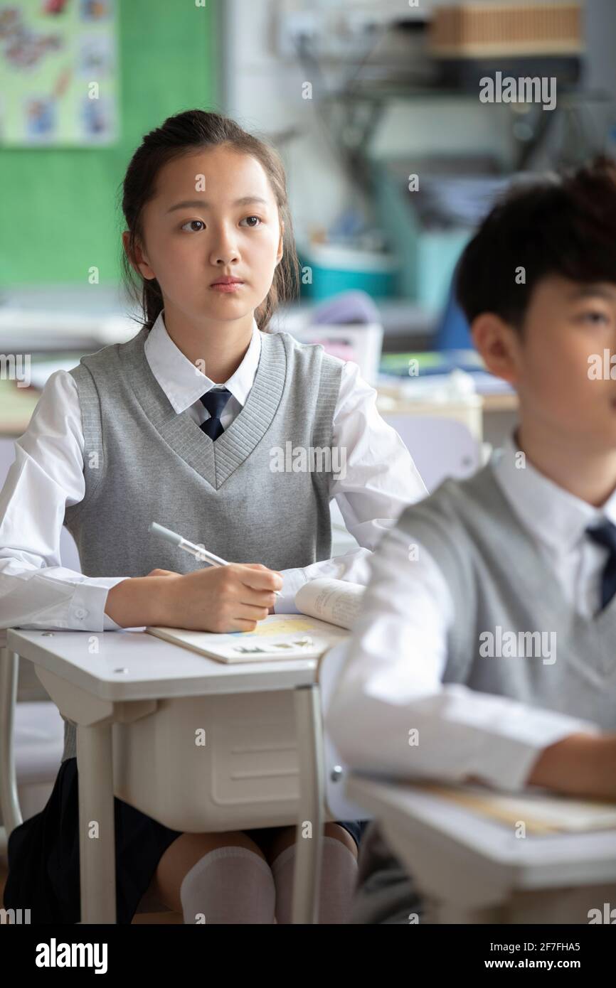 Students learning in classroom Stock Photo - Alamy