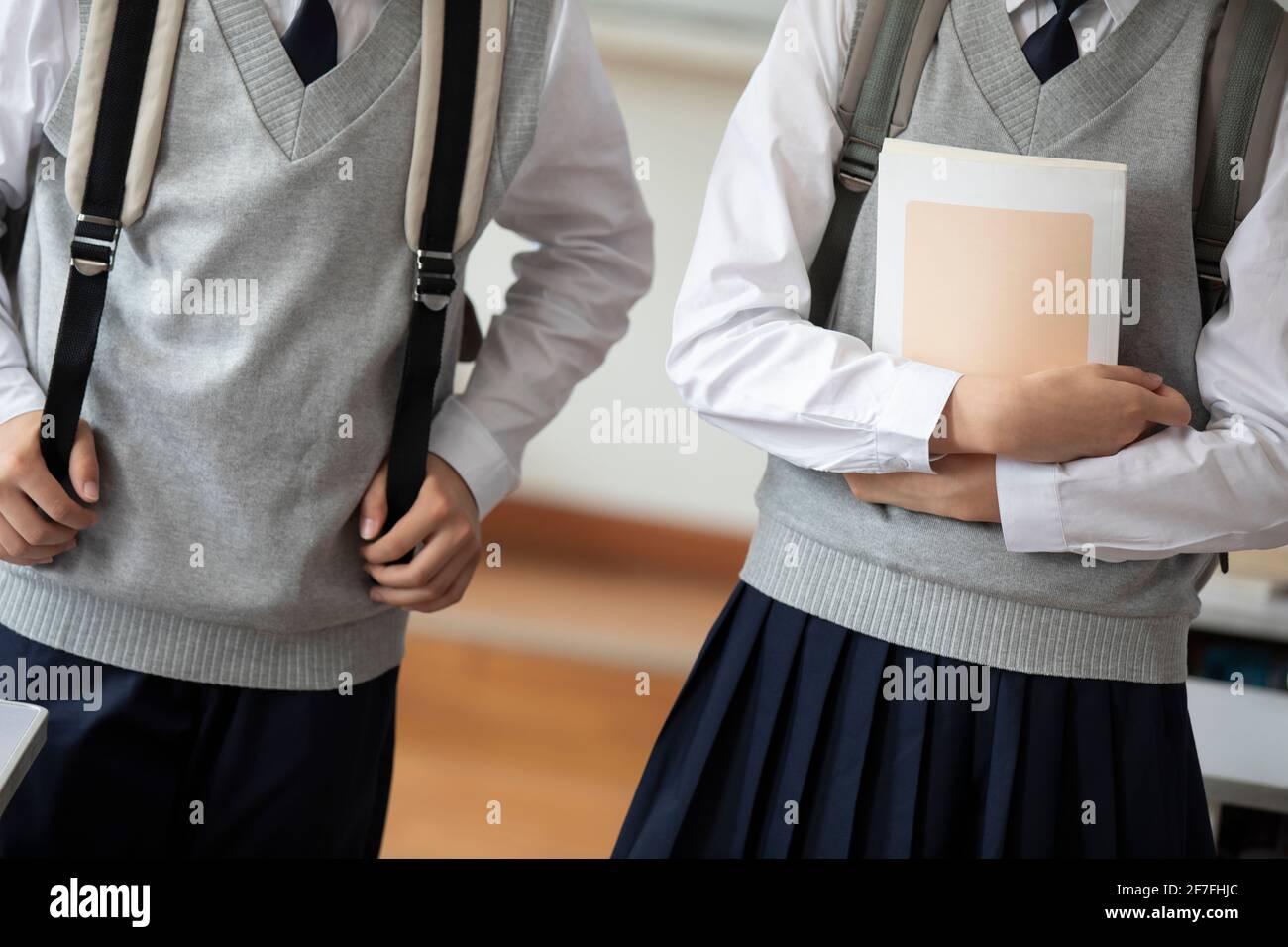 Students standing in classroom Stock Photo - Alamy