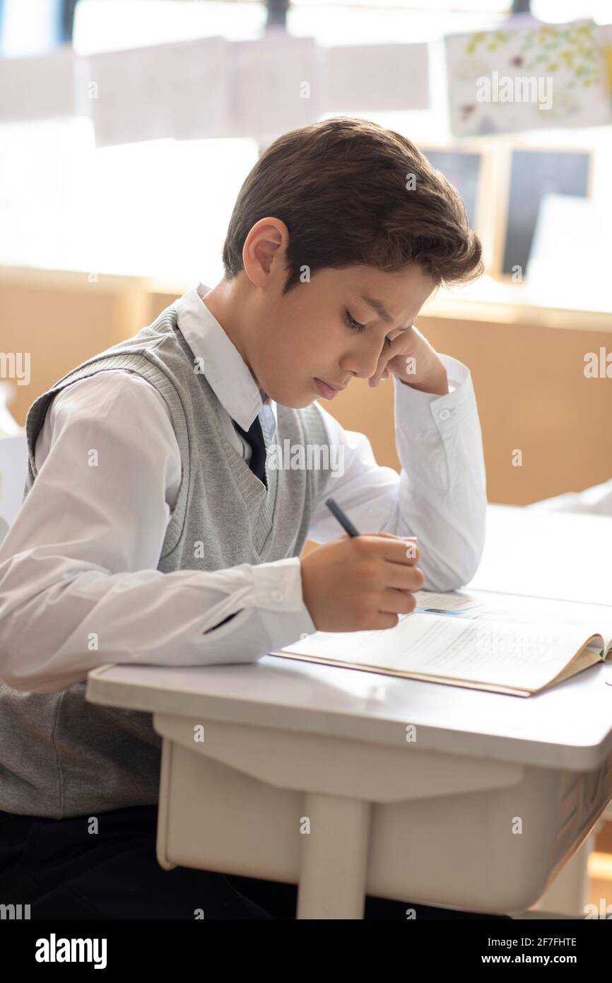 Students learning in classroom Stock Photo - Alamy
