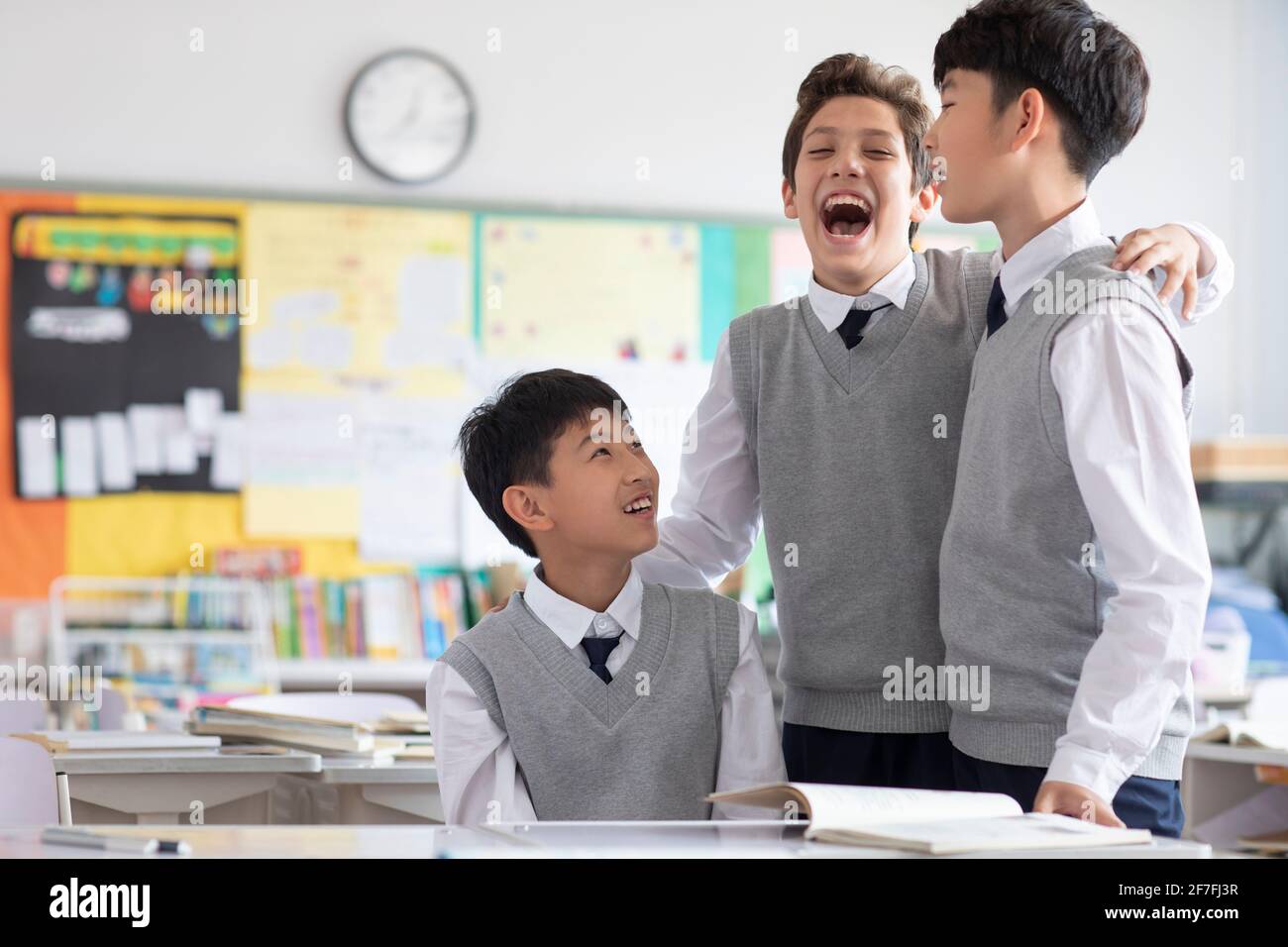 Students having fun in classroom Stock Photo - Alamy