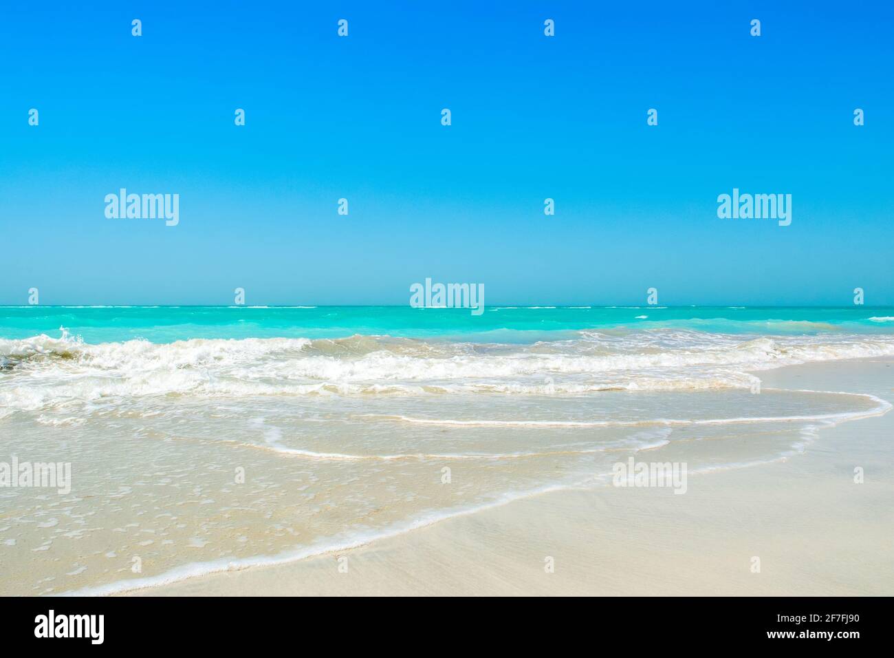 Beautiful landscape of white sandy beach with clear turquoise water in ...