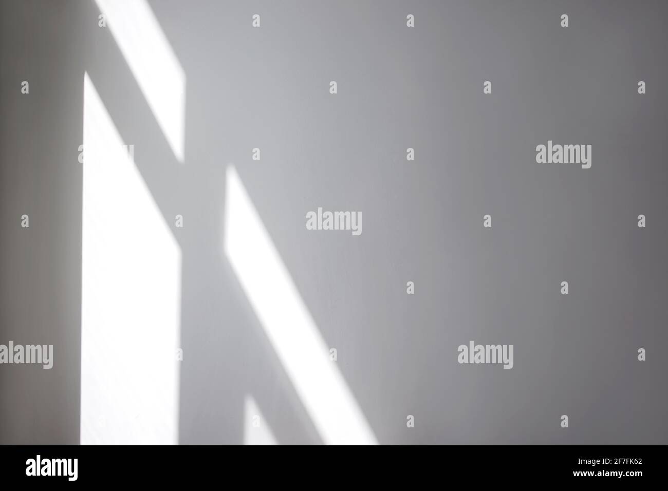 Abstract white wall light with shadows Stock Photo - Alamy