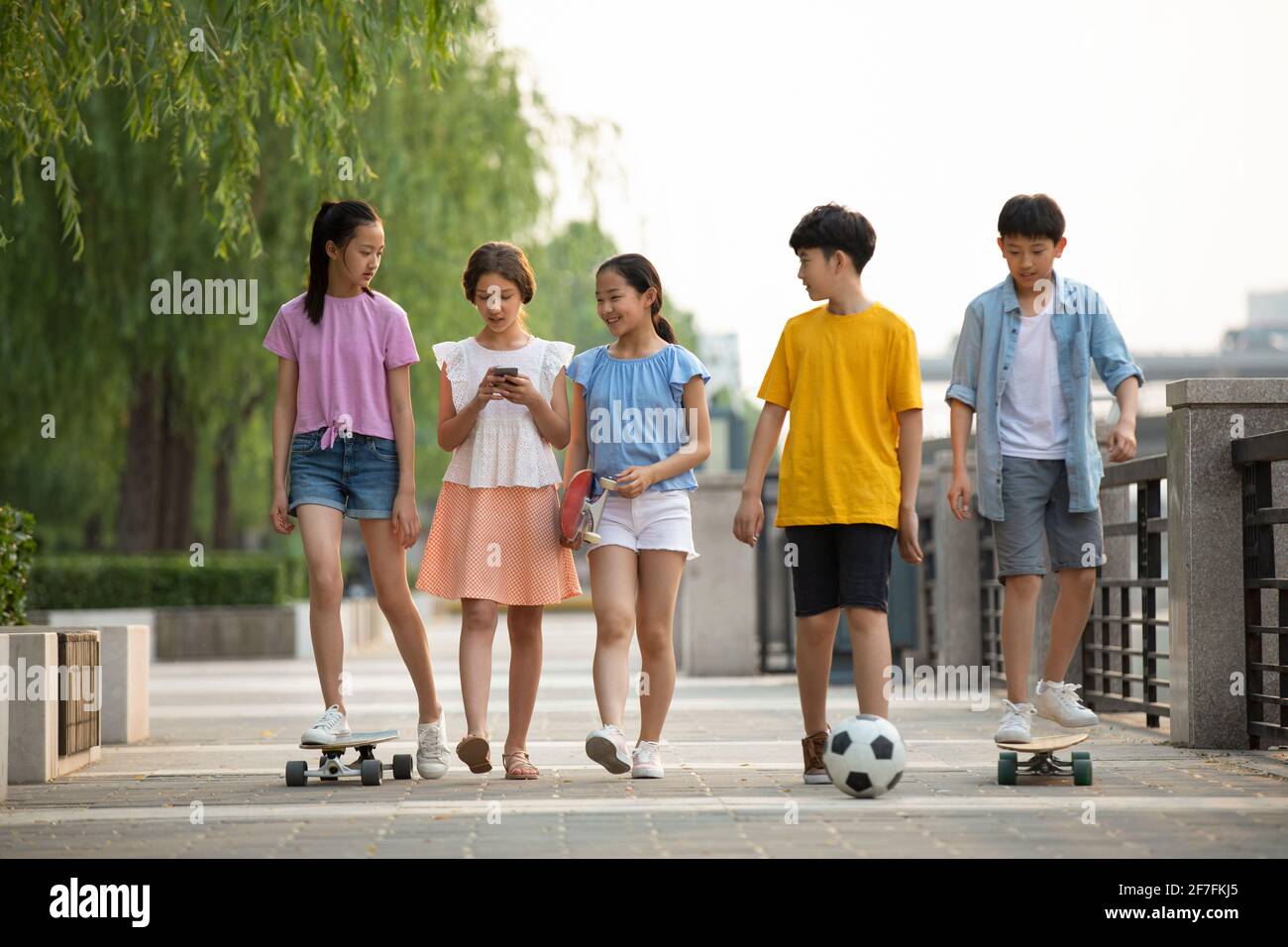 Teenagers having fun outdoors Stock Photo - Alamy