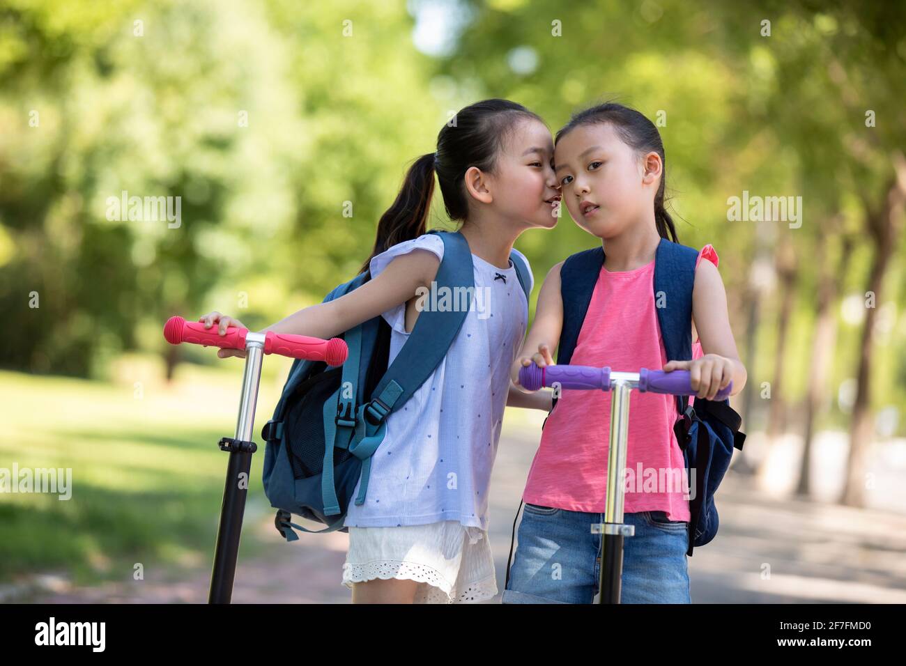 Happy children playing outdoors Stock Photo - Alamy