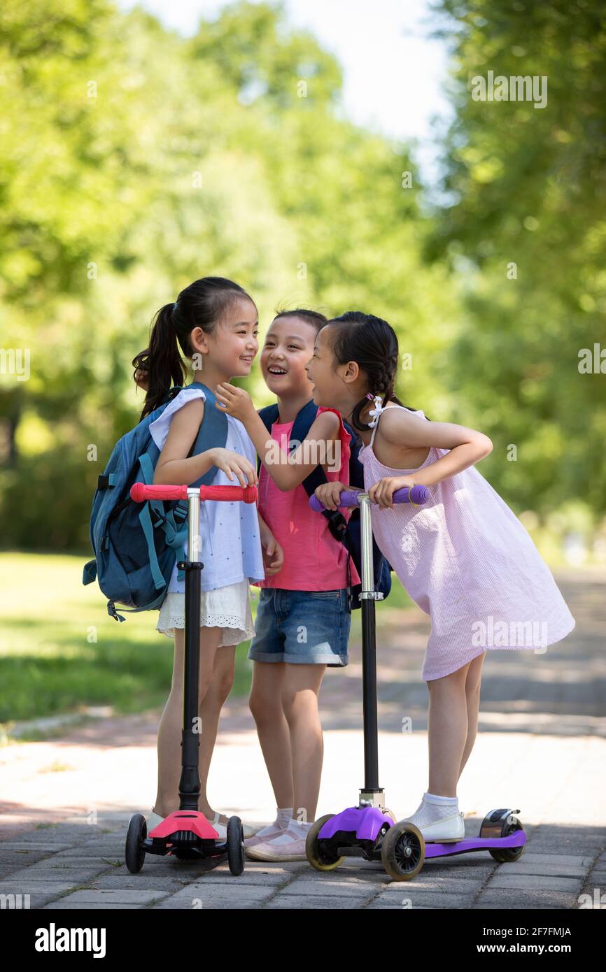 Happy children playing outdoors Stock Photo - Alamy