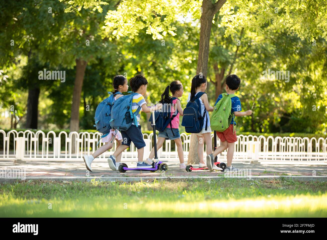 Happy children going to school Stock Photo - Alamy
