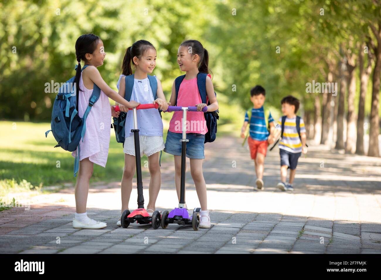 Happy children going to school Stock Photo - Alamy