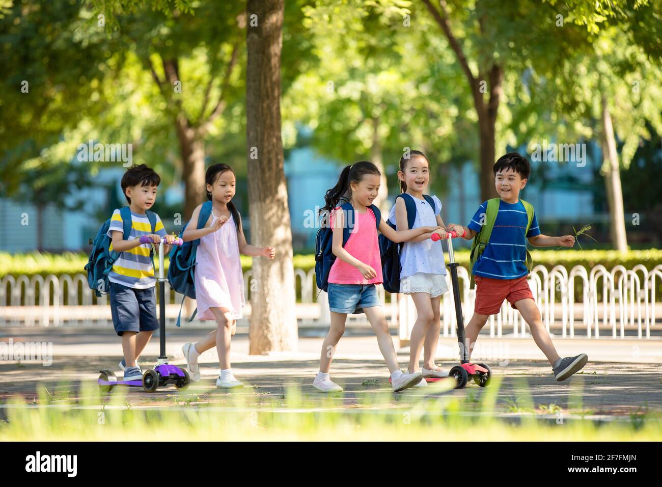 Happy children going to school Stock Photo - Alamy