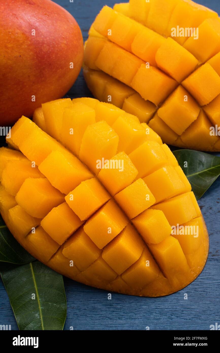 Top view design concept of beautiful mango tropical fruit with sliced ...