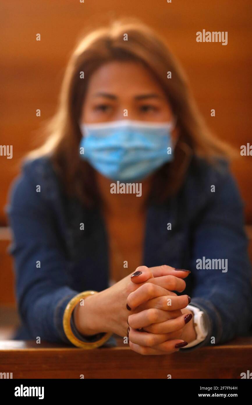 Praying inside catholic church hi-res stock photography and images - Alamy