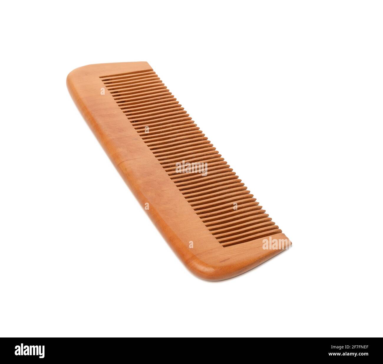 wooden brown hair comb isolated on white background, top view Stock ...