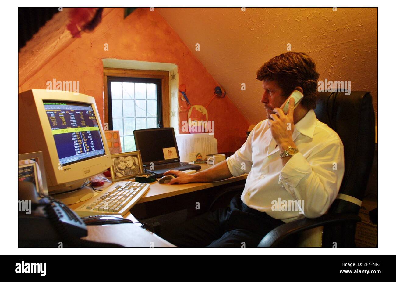 Mitch Mosley trades on his computer from his home in Oxted.pic David ...