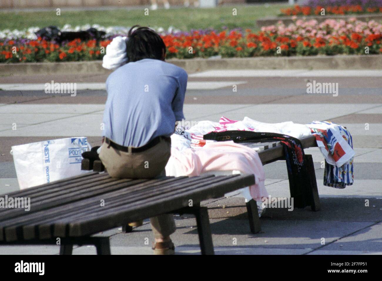 a person selling clothes - Dresden 1990 Stock Photo - Alamy