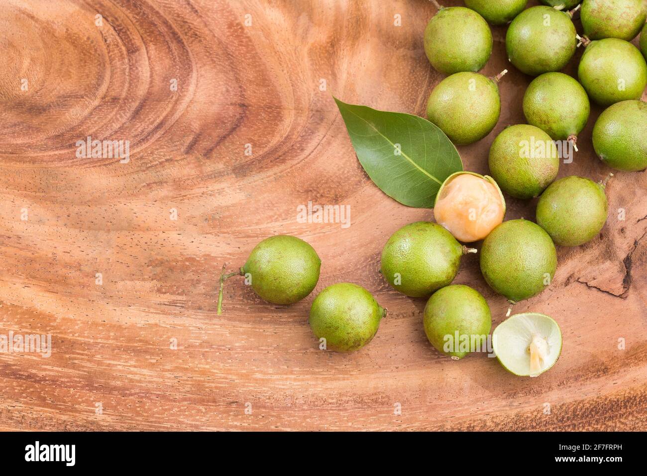 Fresh ripe peeled quenepa fruit - Melicoccus bijugatus Stock Photo - Alamy