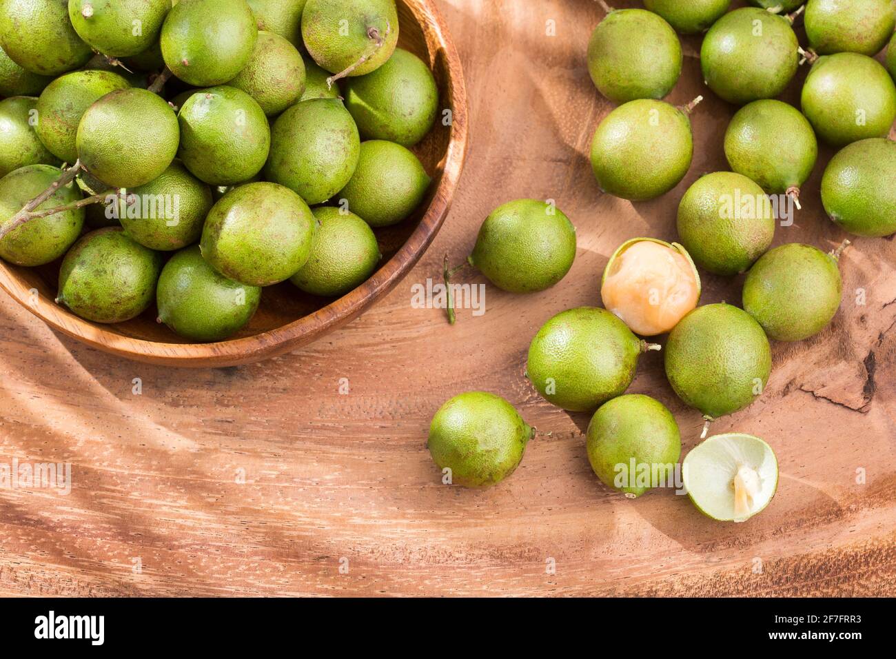 Fresh ripe peeled quenepa fruit - Melicoccus bijugatus Stock Photo - Alamy