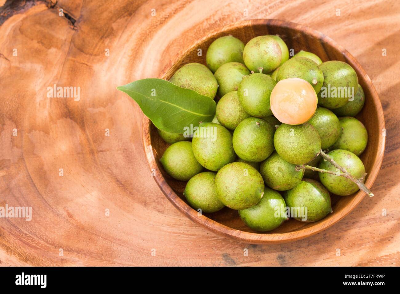 Fresh ripe peeled quenepa fruit - Melicoccus bijugatus Stock Photo - Alamy