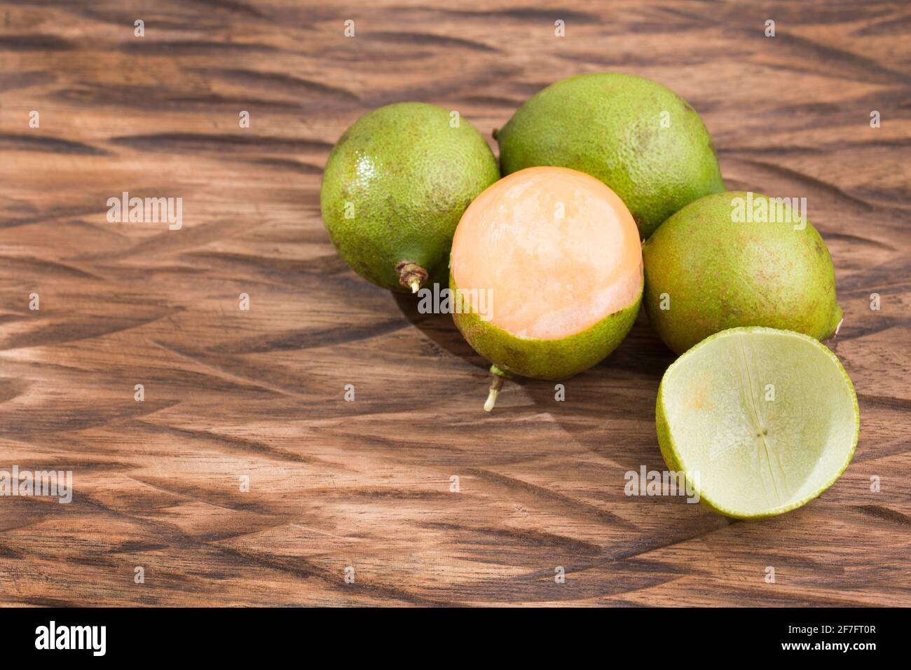 Fresh ripe peeled quenepa fruit - Melicoccus bijugatus Stock Photo - Alamy