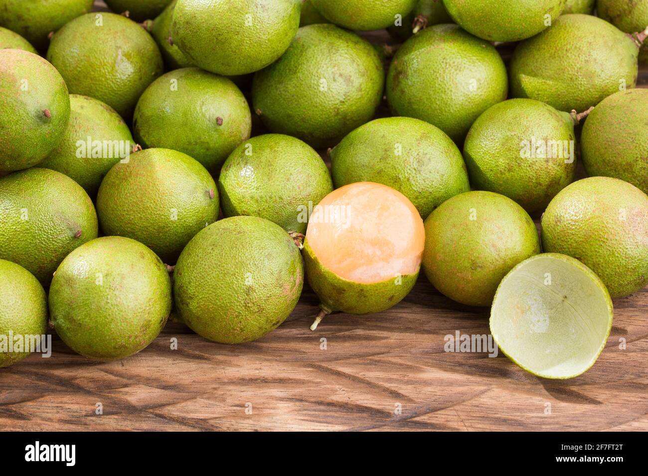 Fresh ripe peeled quenepa fruit - Melicoccus bijugatus Stock Photo - Alamy