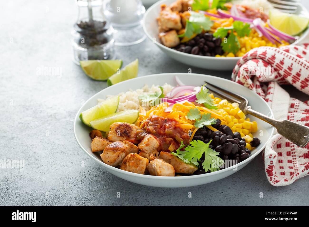 Mexican burrito bowl with salsa chicken and beans Stock Photo - Alamy