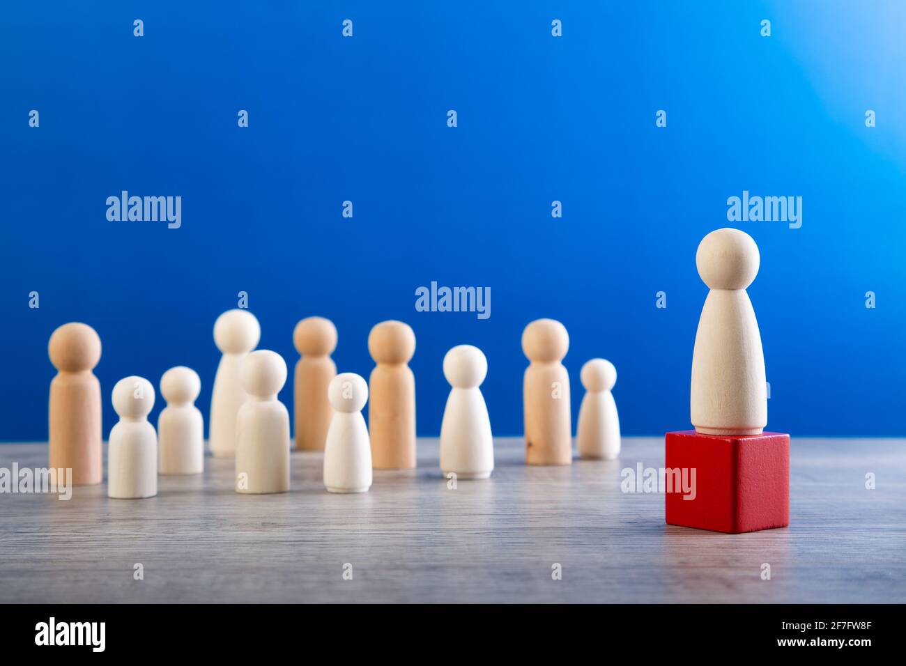 successful team leader, Leader standing out from the crown Stock Photo ...