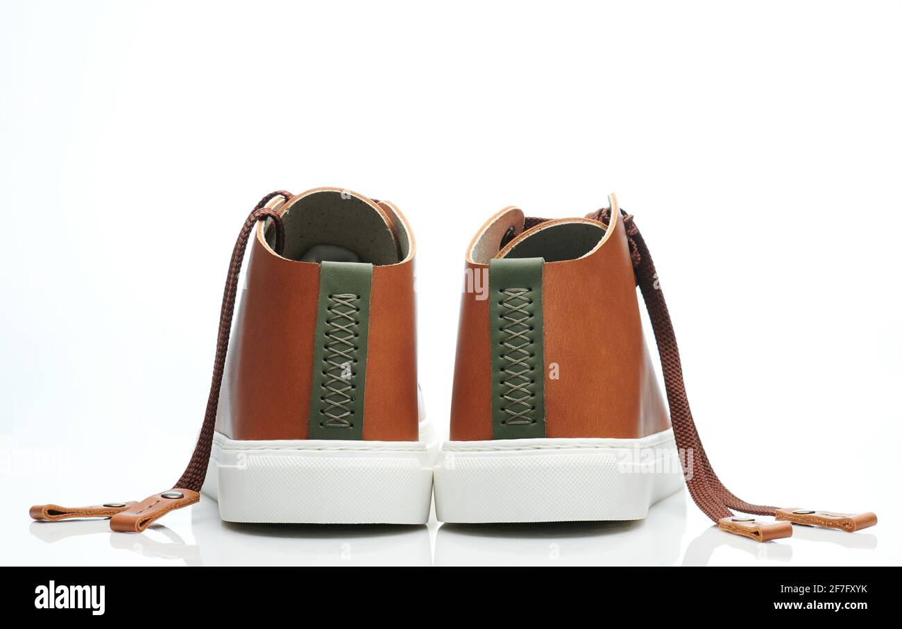 Back of brown leather shoes isolated on white studio background Stock ...