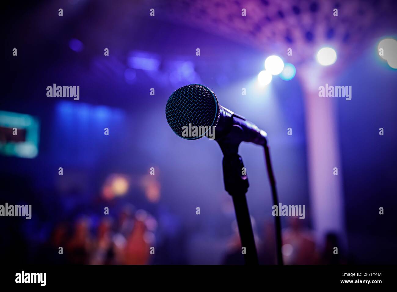 The microphone on stage in a concert hall Stock Photo - Alamy
