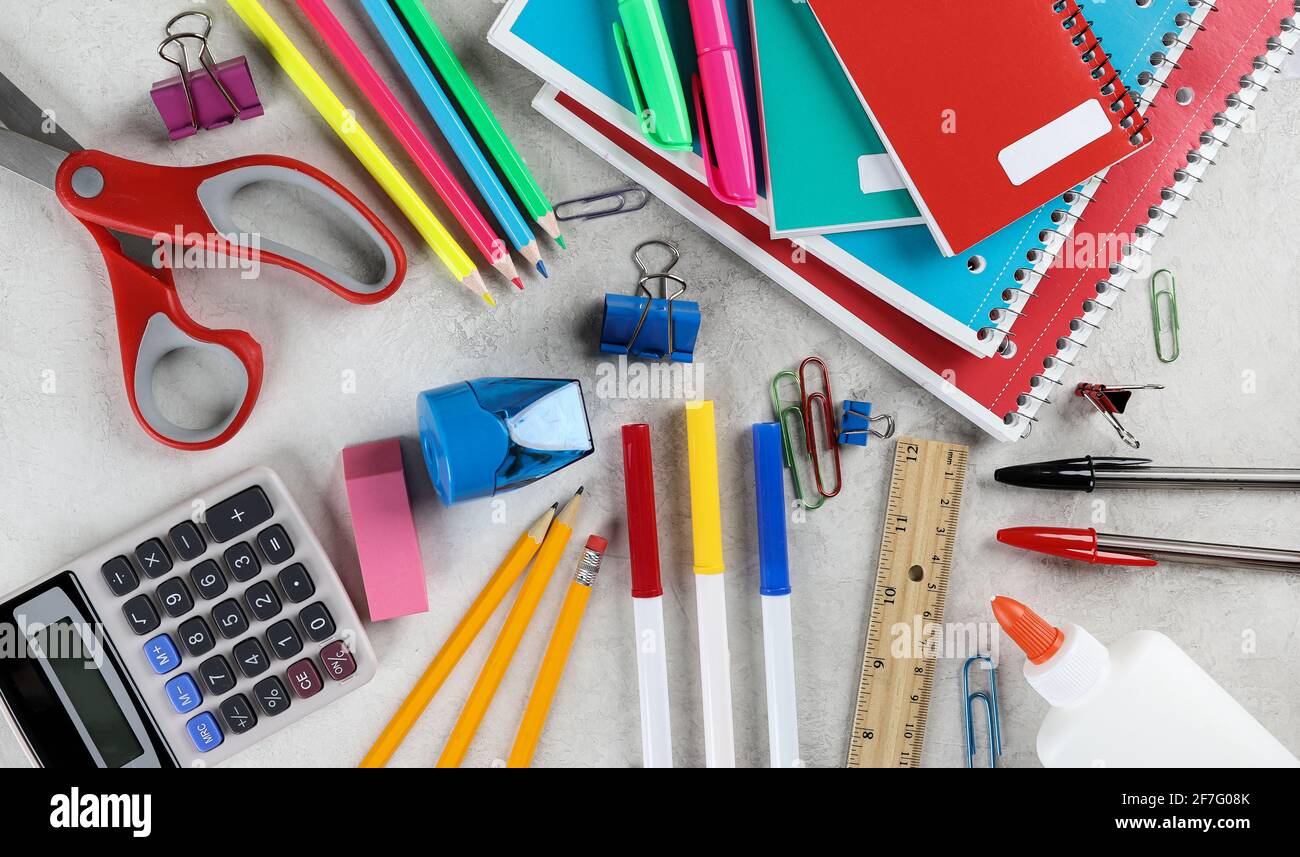 Overhead view of an assortment of school supplies on a table Stock ...